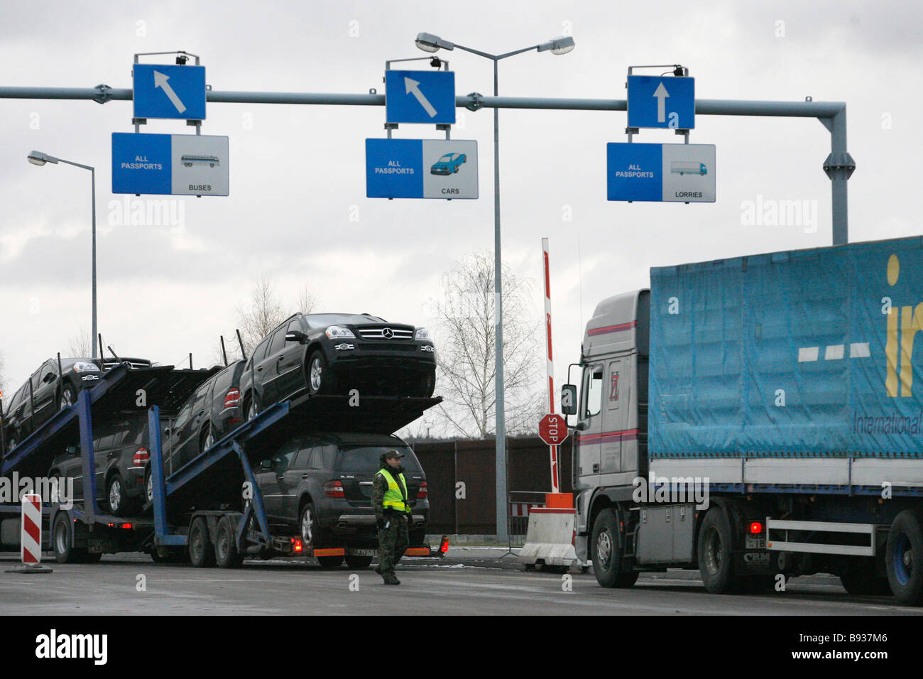 A line of loaded trucks waiting for customs clearance at Dorohust on ...