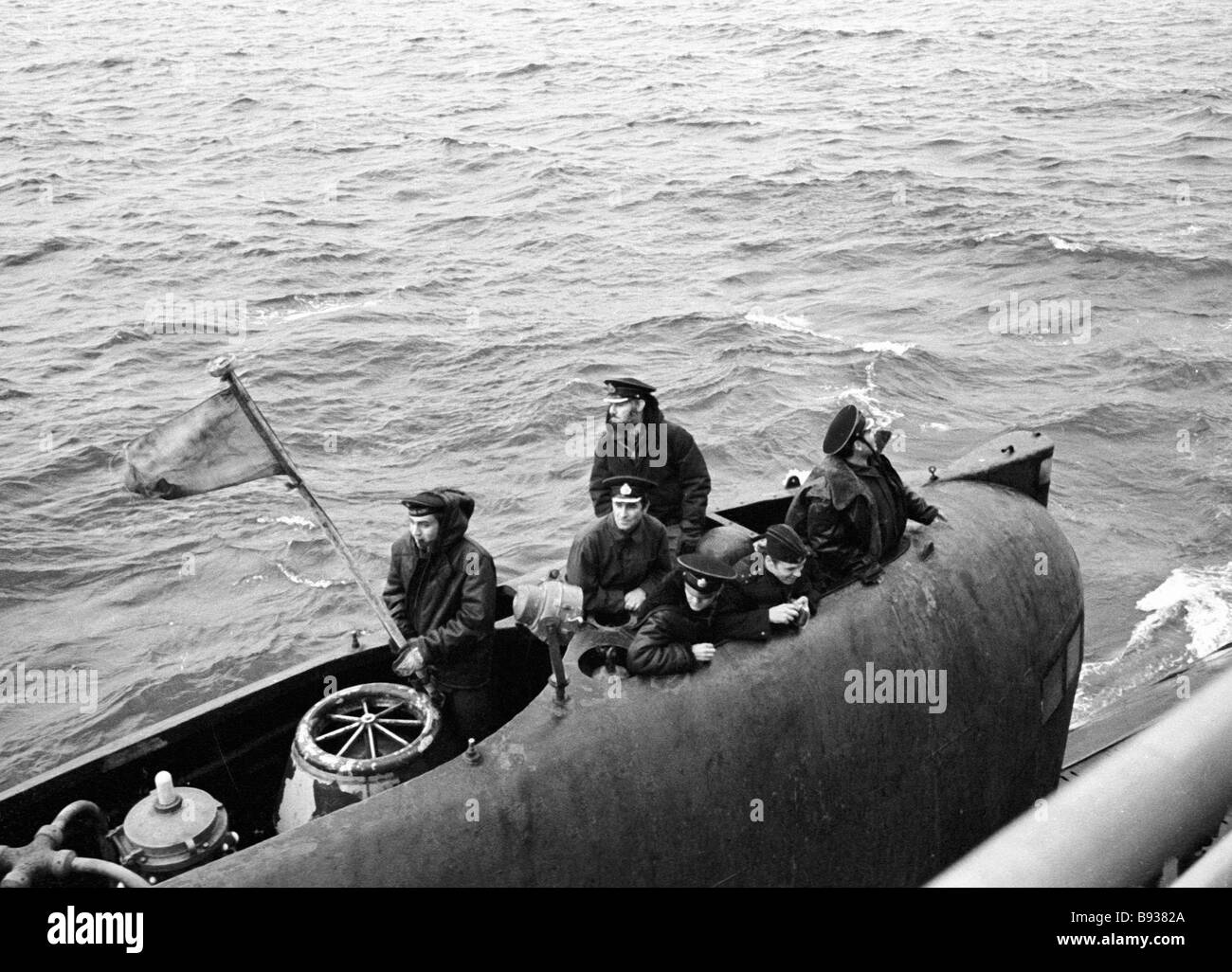 Sailors on submarine bridge during Soviet warships training voyage in ...