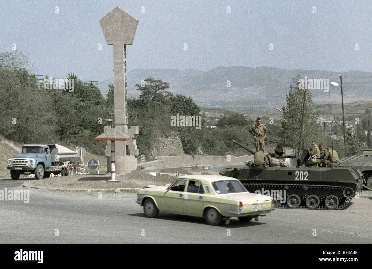 Soldiers supported by an armored vehicle at a checkpoint Stepanakert ...