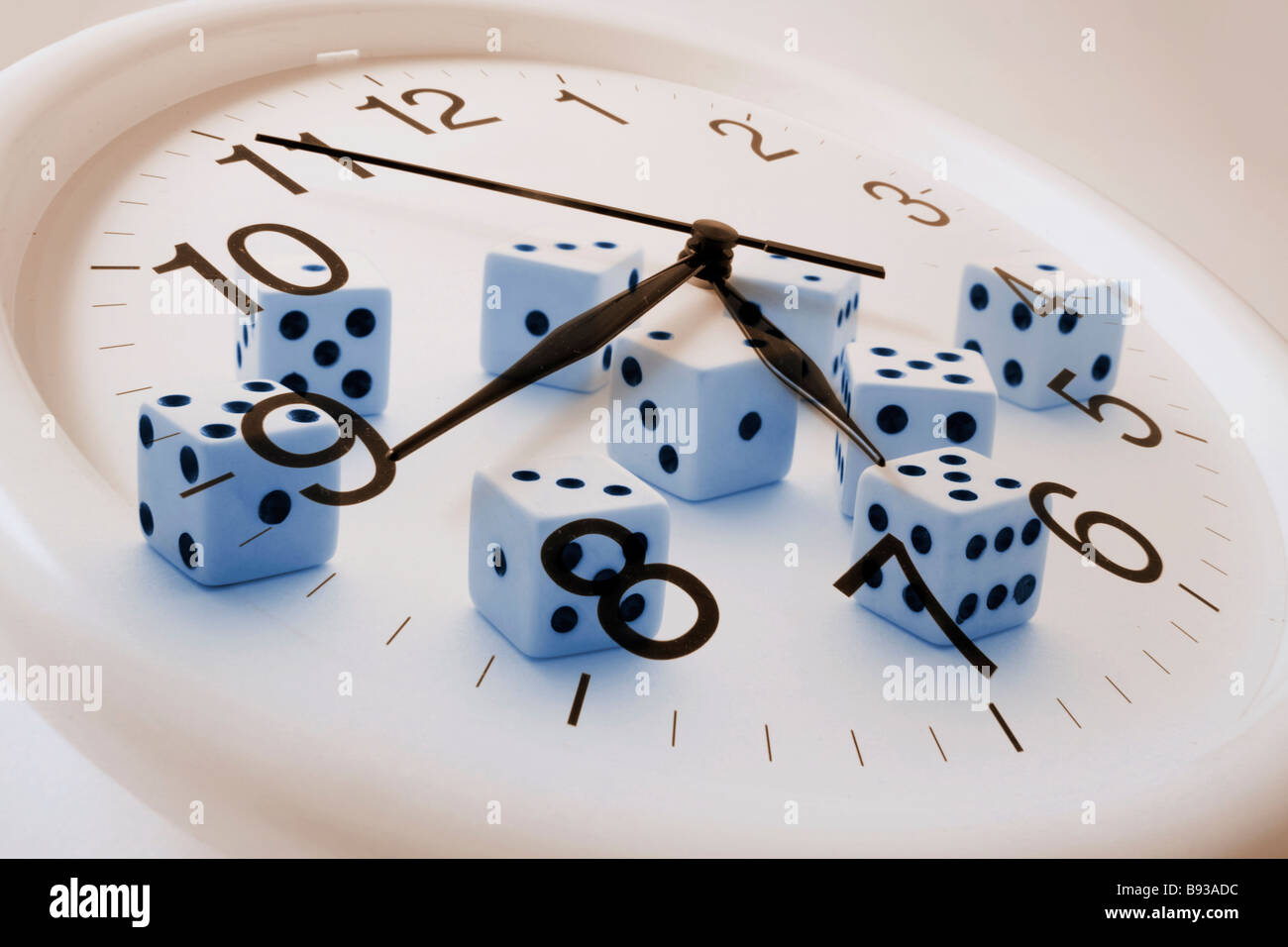 Clock and Dice Stock Photo - Alamy