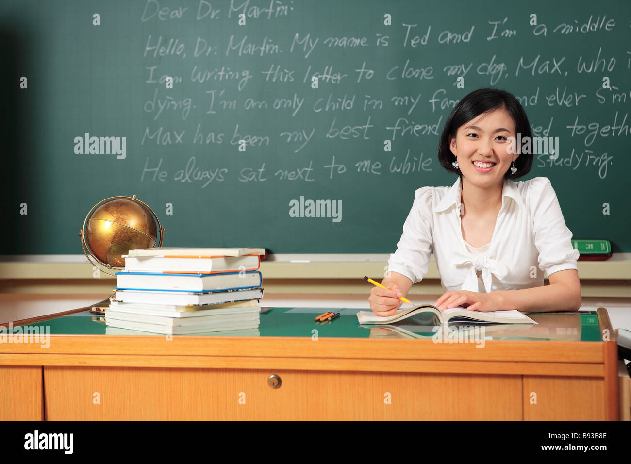 Miss Teacher in School Stock Photo - Alamy