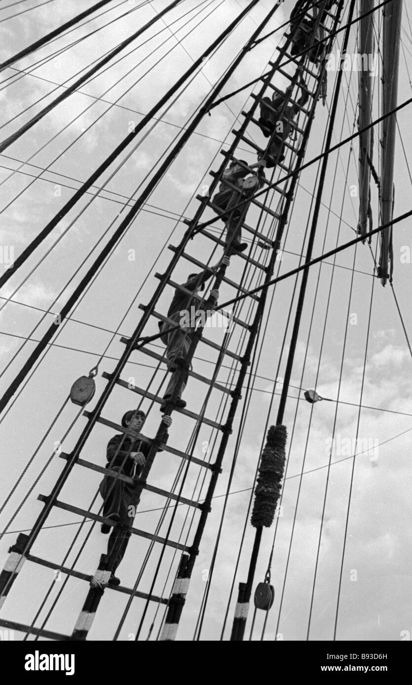Cadets of the Sedov four mast bark going up to set sail Stock Photo - Alamy