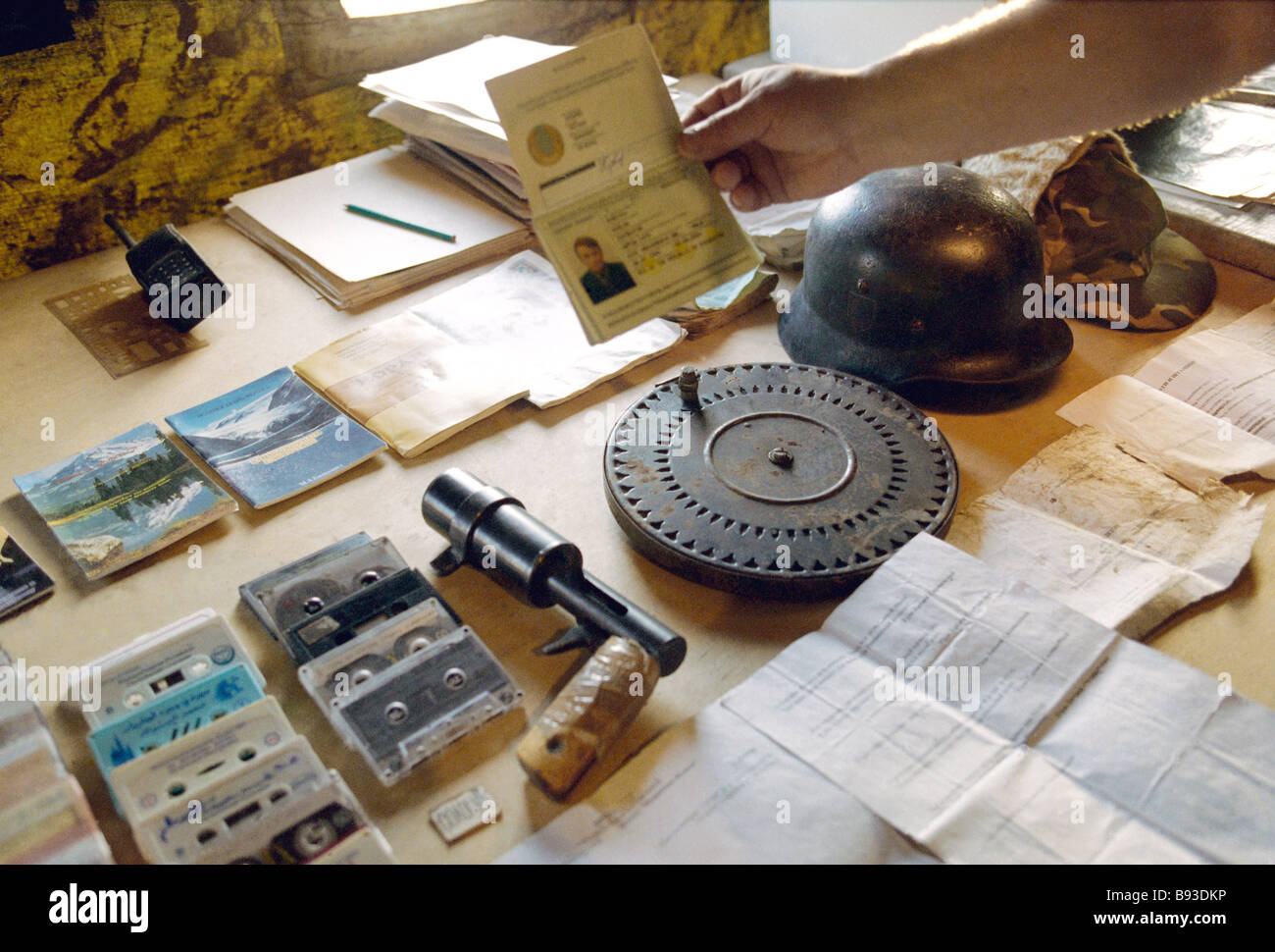 Documents and arms seized by a special reconnaissance squad of the 45th ...