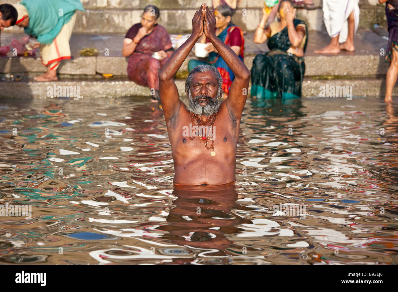 Bathing in the Ganges River in Varanasi India Stock Photo - Alamy