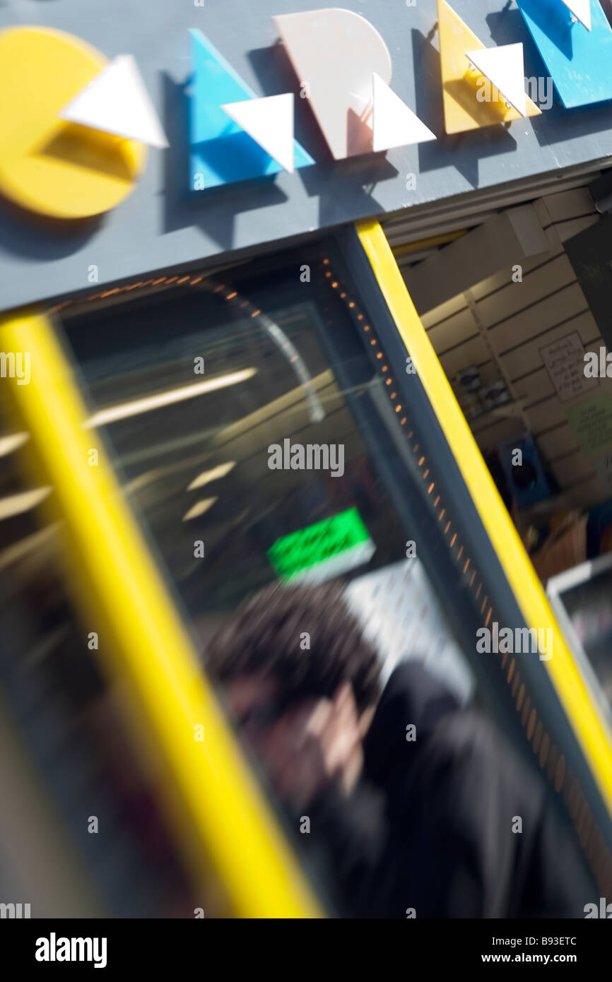 Man walking outside shop hi-res stock photography and images - Alamy
