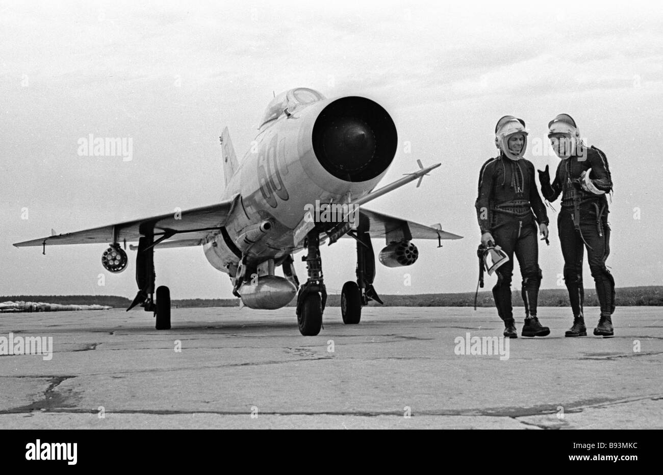 A fighter pilots near their combat plane Stock Photo - Alamy