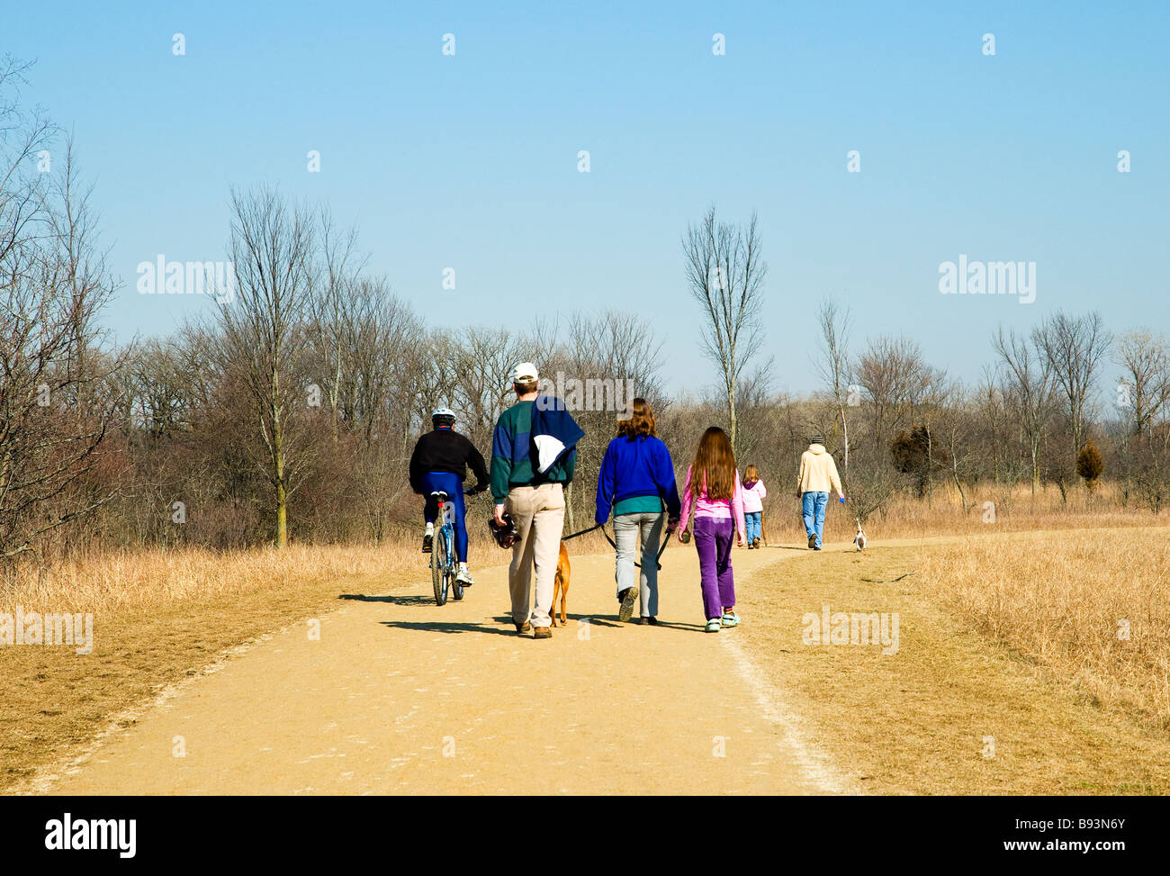 Family walking on nature trail Stock Photo - Alamy