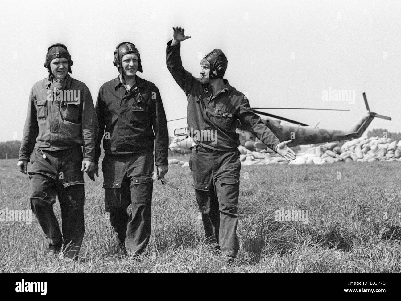 Crew of a helicopter doing radiation reconnaissance on territories ...