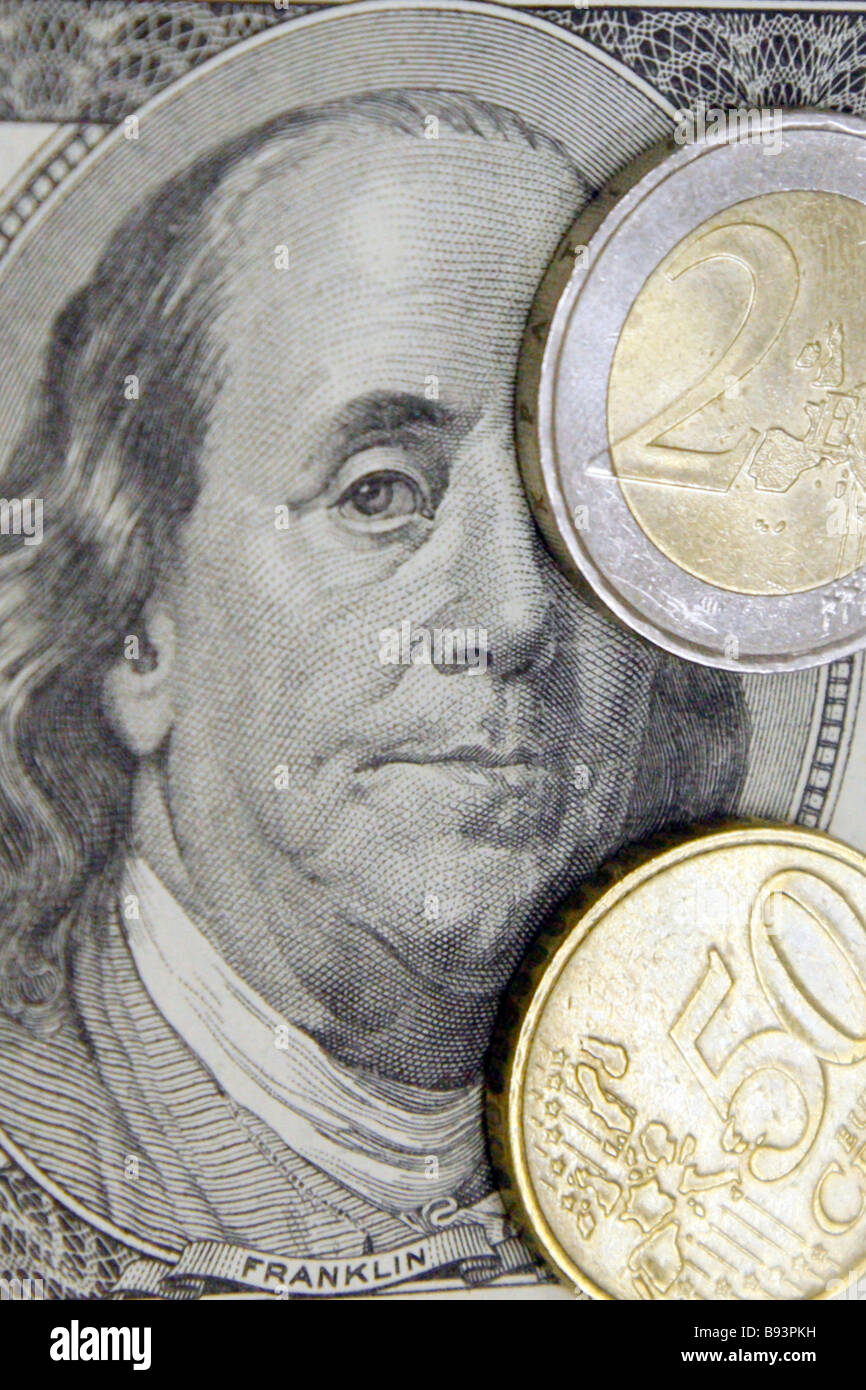 Banknote and coins Stock Photo - Alamy