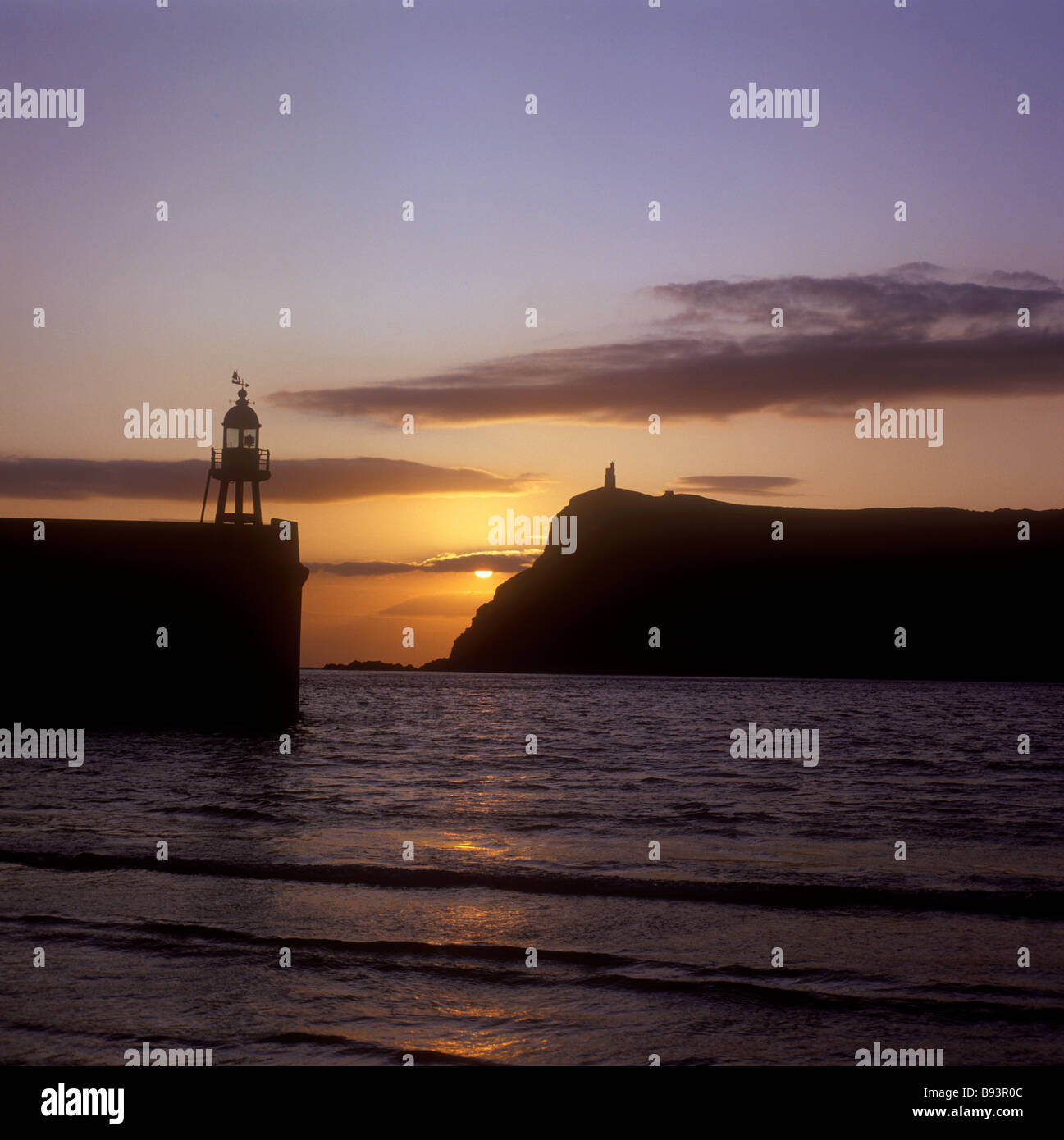 Sunset seen from Port Erin with view showing Milner's Tower on Bradda ...