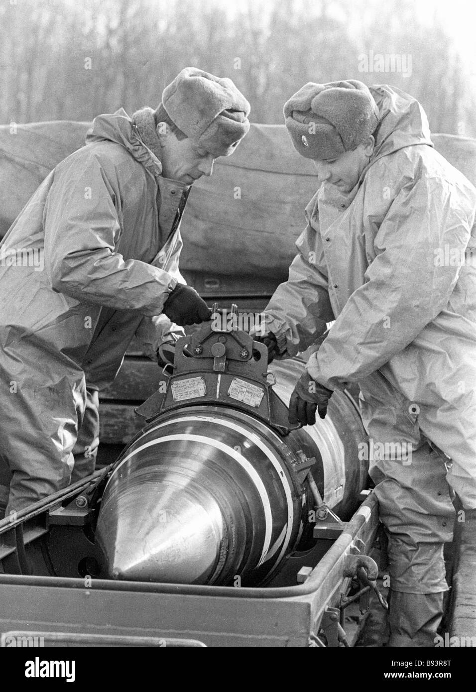 The military load nuclear warheads in containers for further withdrawal ...