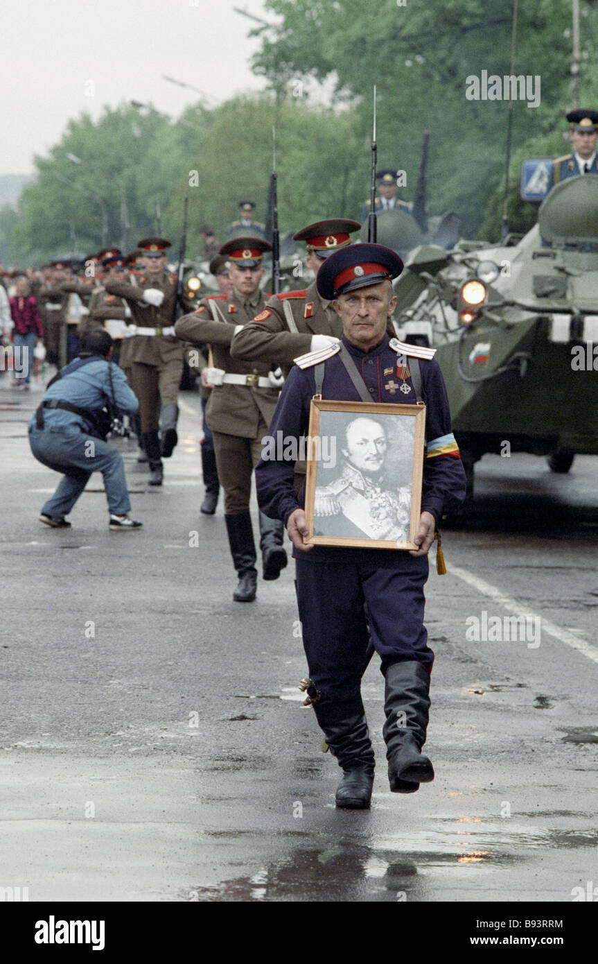A funeral procession on the way to Voskresensky Resurrection cathedral ...