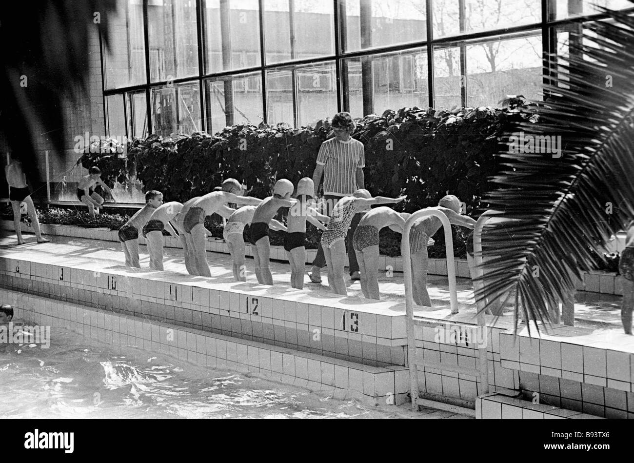 Teaching kids to swim at the Malyutka swimming pool at the Minsk Water ...