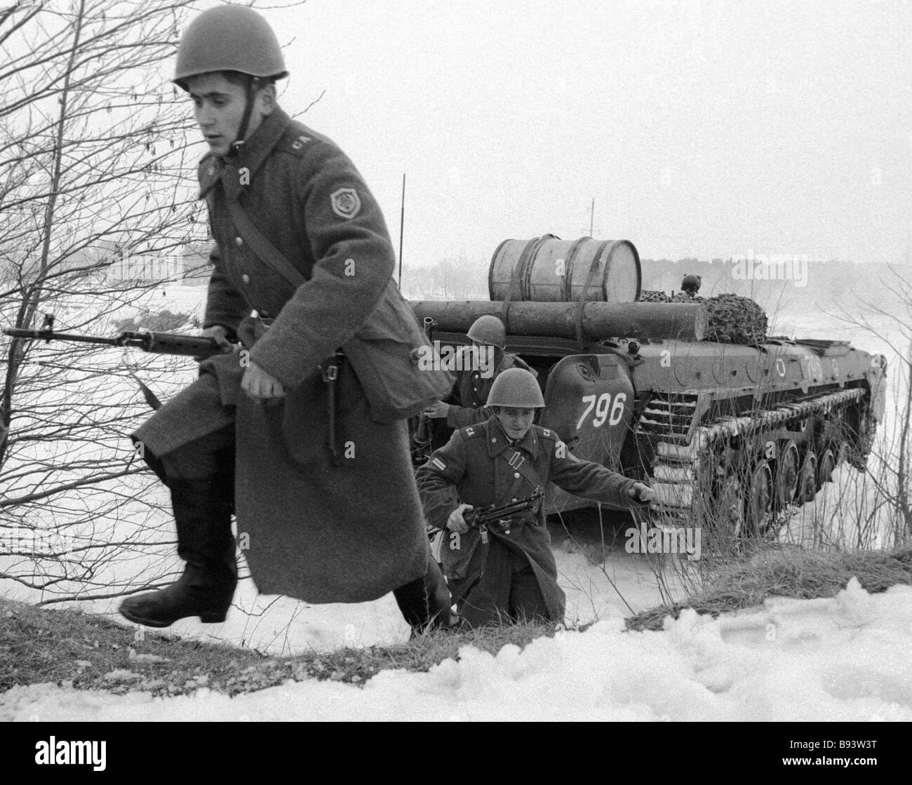 Motorized infantry piles out of the infantry combat vehicle Stock Photo ...