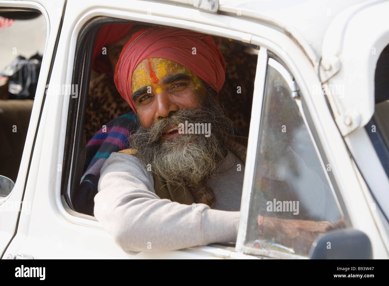 Holy indian man driving car allahabad hi-res stock photography and ...