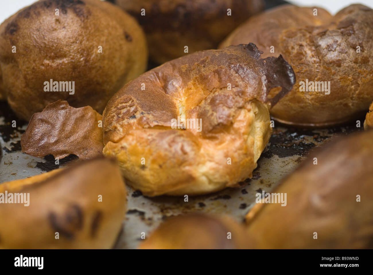 Round Yorkshire Puddings on baking tray Stock Photo - Alamy