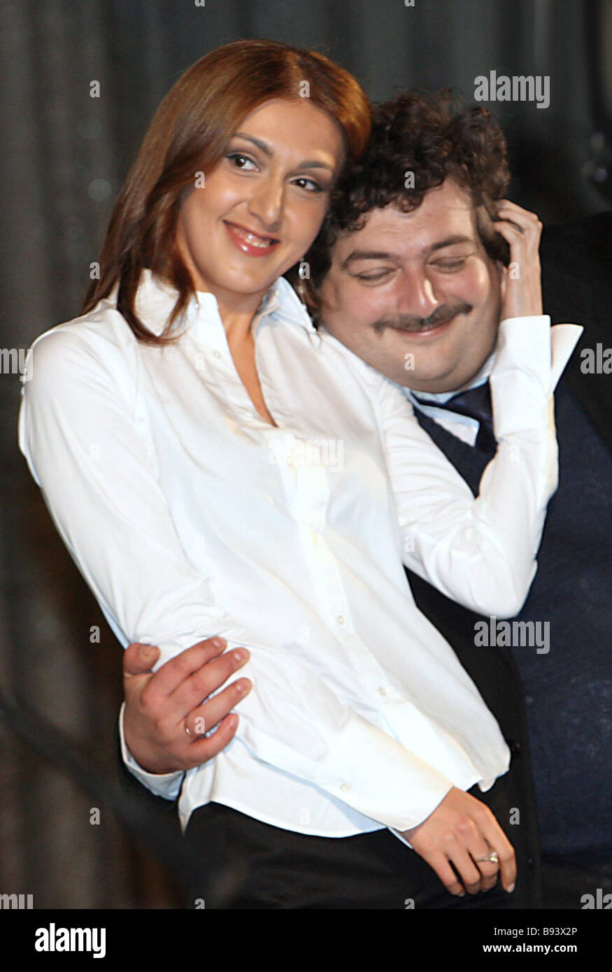 Television anchor Yekaterina Mtseturidze and writer Dmitry Bykov before ...