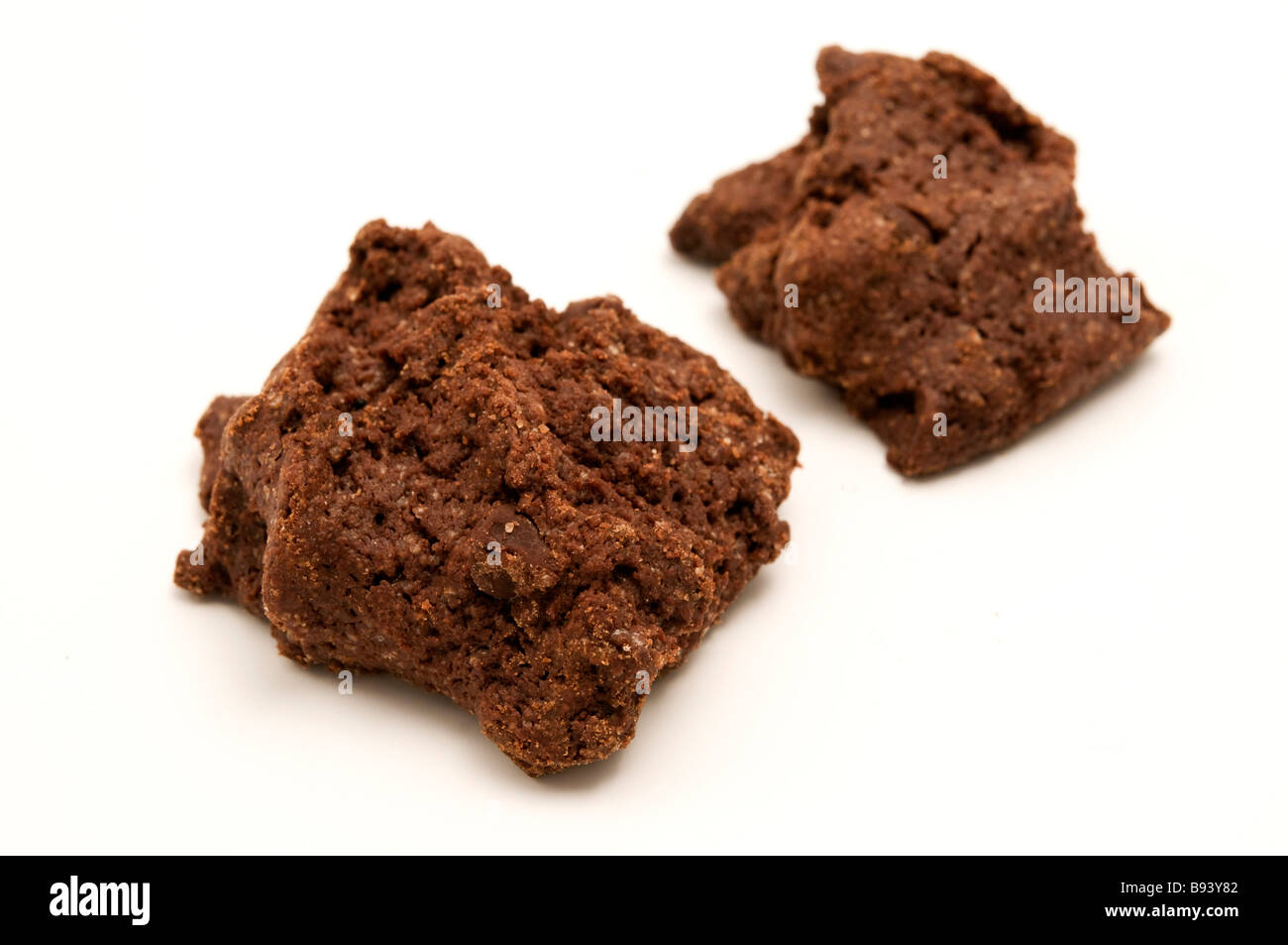 Chocolate nuggets on a white background Stock Photo - Alamy
