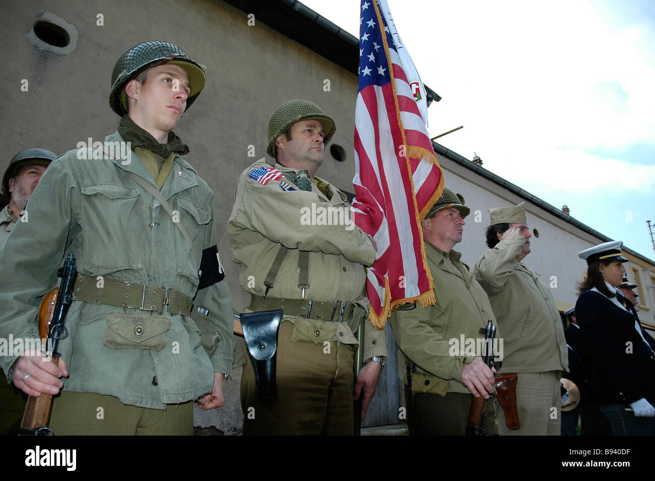 Us GI soldiers line up for a WWII re-enactment during a commemorative ...