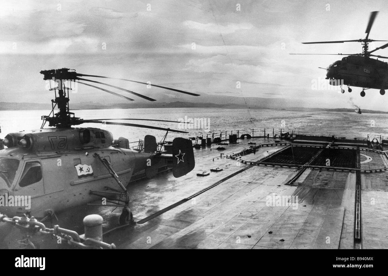 Kamov Ka 27 Helix helicopters taking off from deck of Guided missile ...