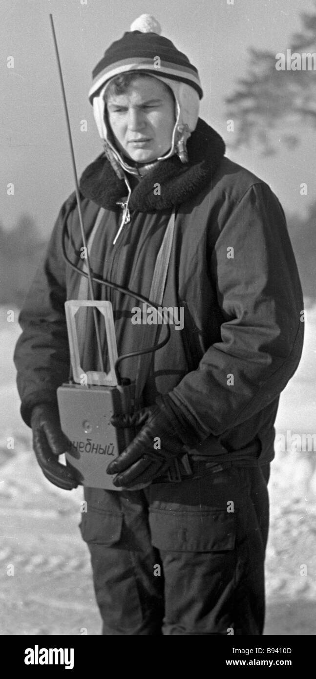 Cosmonaut Valentina Tereshkova studies radio communications during space flight training Stock ...