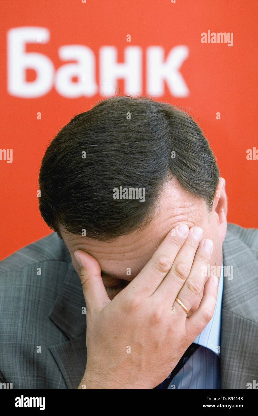 An overworked clerk in the Alfa Bank office Moscow Stock Photo - Alamy