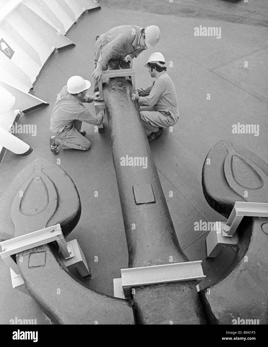 Inspecting a waist anchor of a light ship Tibor Samueli an ocean going ...