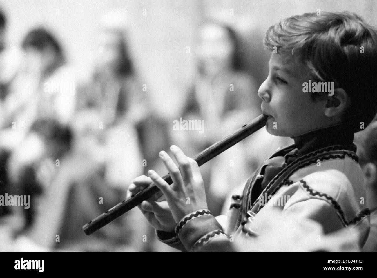 A school student playing a salamuri flute a Georgian folk musical ...