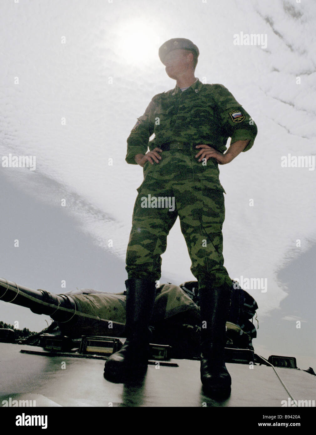 A trooper standing on top of an infantry fighting vehicle on Airborne ...