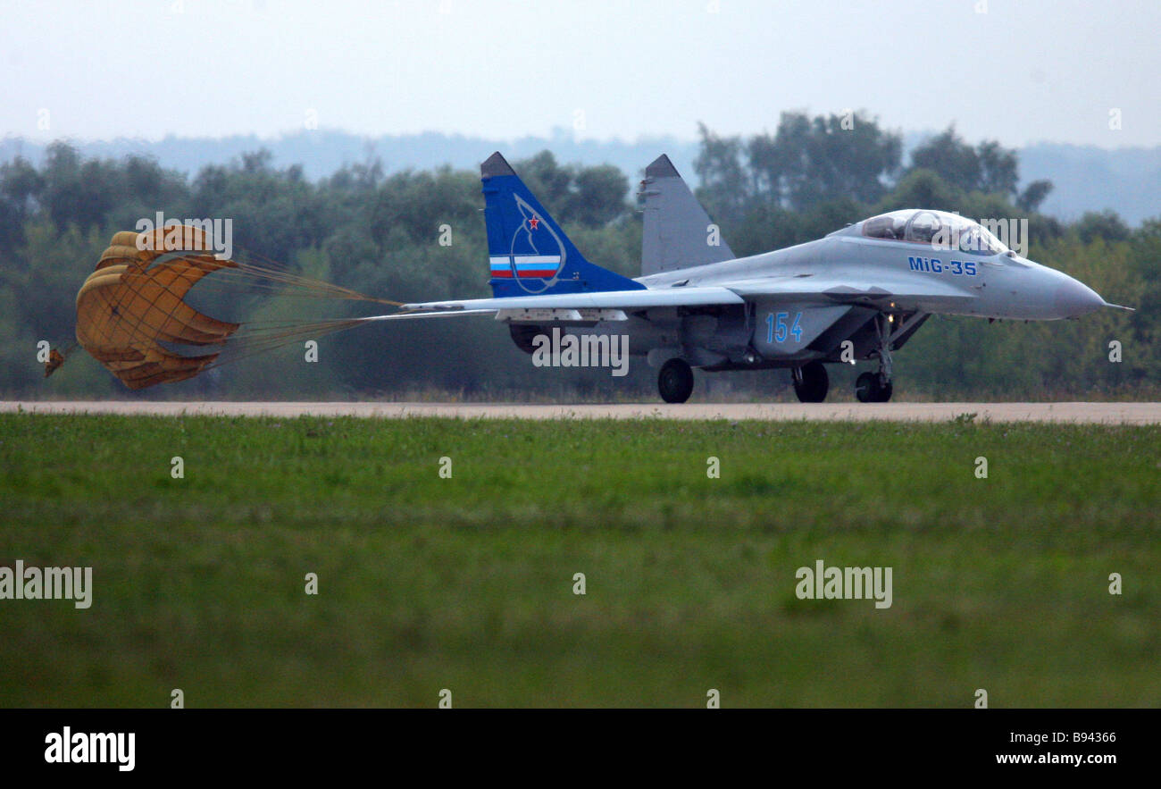 A MIG 35 jet in a preliminary flight shortly before the opening of the ...