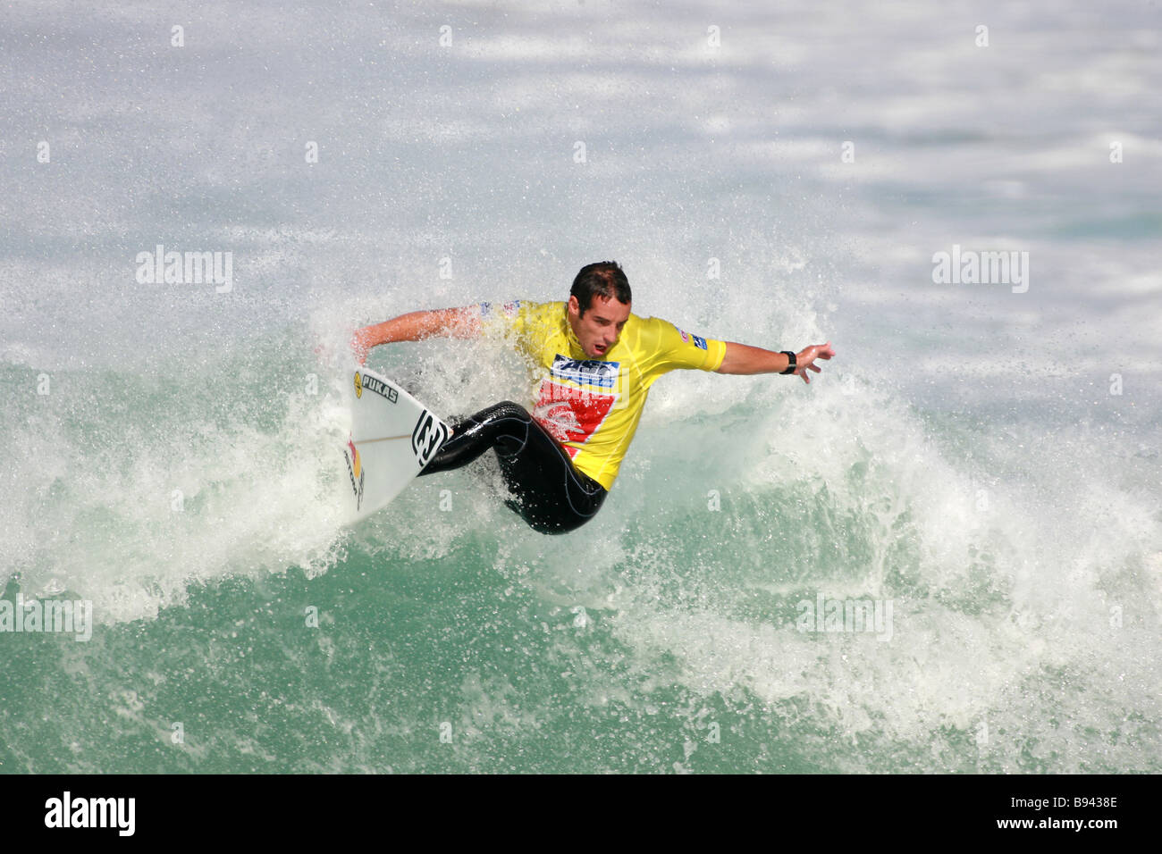 A Surfer riding a wave Stock Photo - Alamy
