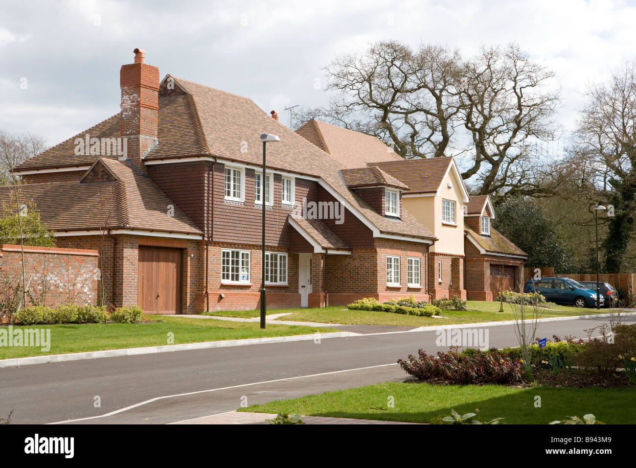 Detached houses with garage Stock Photo - Alamy