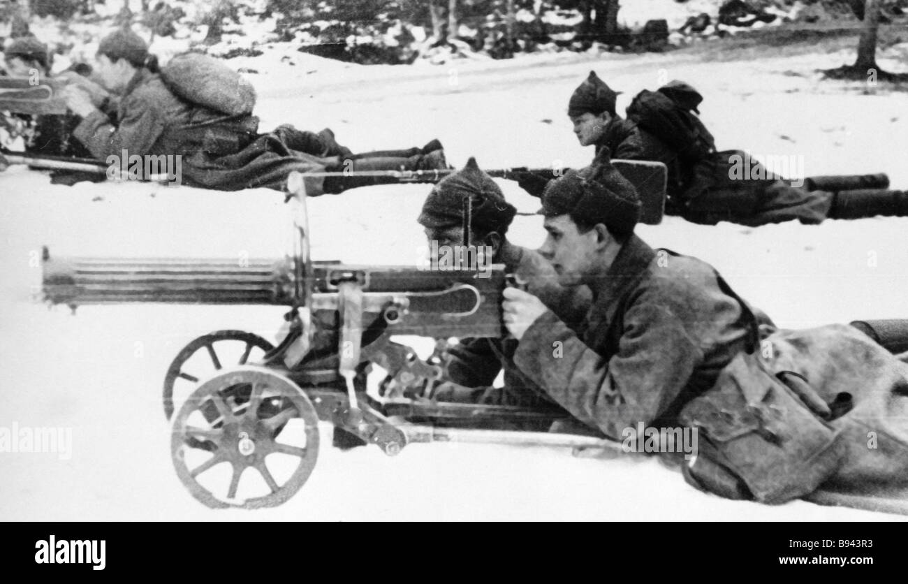 Machine gunners at firing position Stock Photo - Alamy