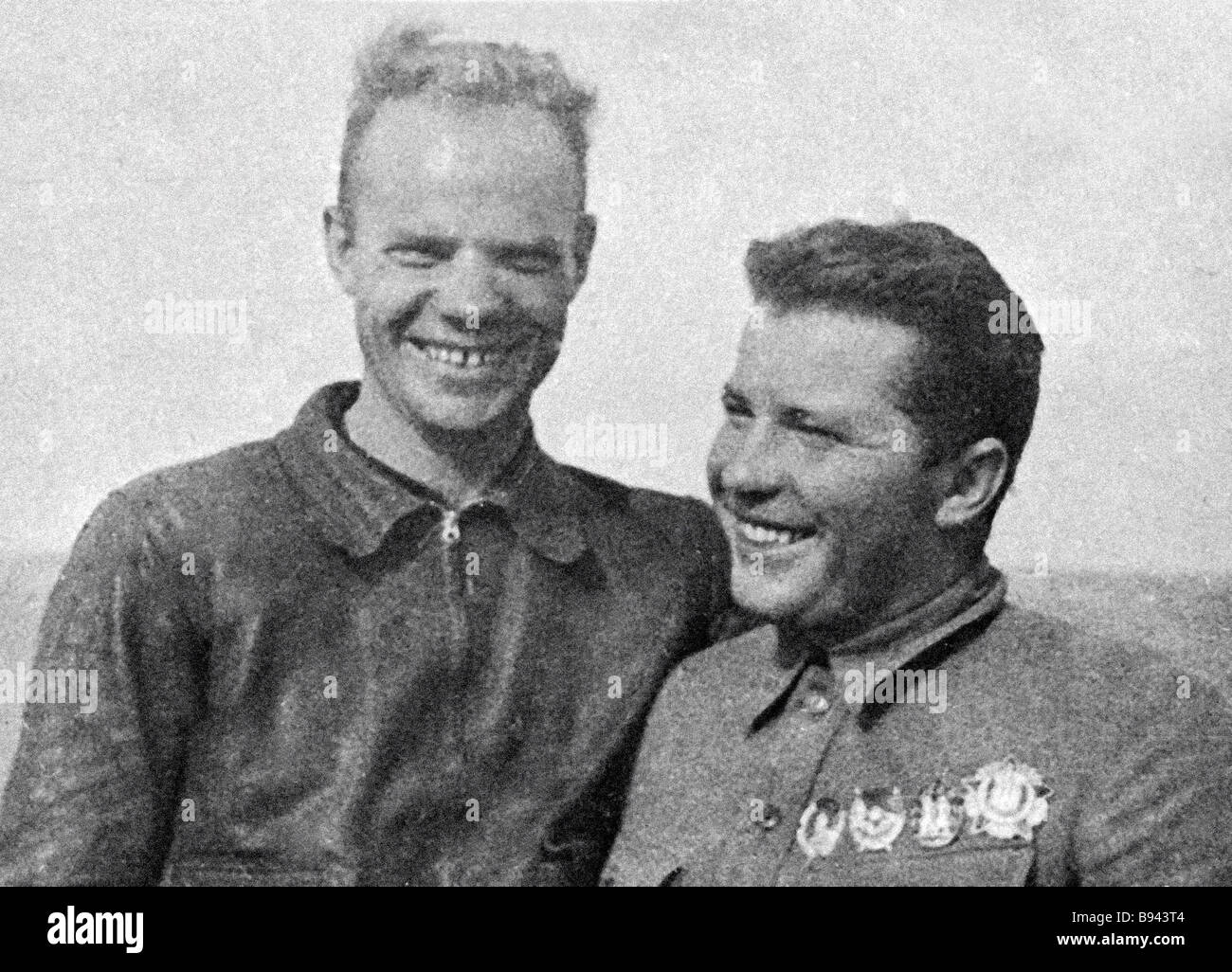 Soviet pilots Sergei Gritsevets left and Grigory Kravchenko twice Heroes of the U S S R Stock ...