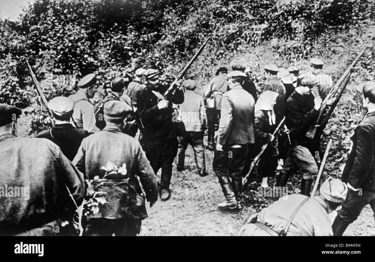 Partisans receiving weapons at a partisans base Stock Photo - Alamy