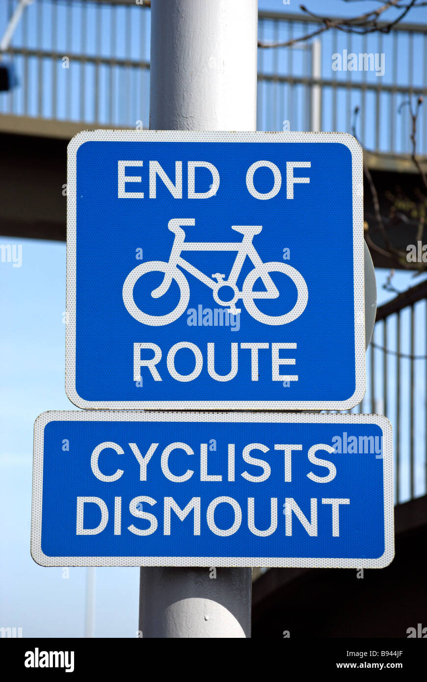 british blue and white end of cycle route sign with another sign ...