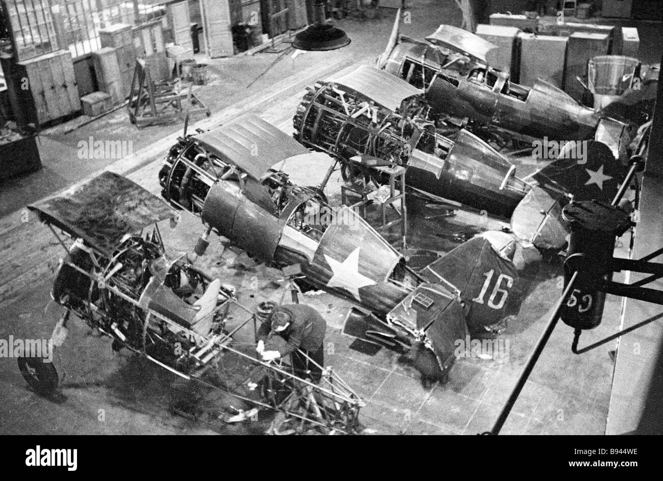 Aircraft in repair at a Moscow factory during WWII Stock Photo - Alamy