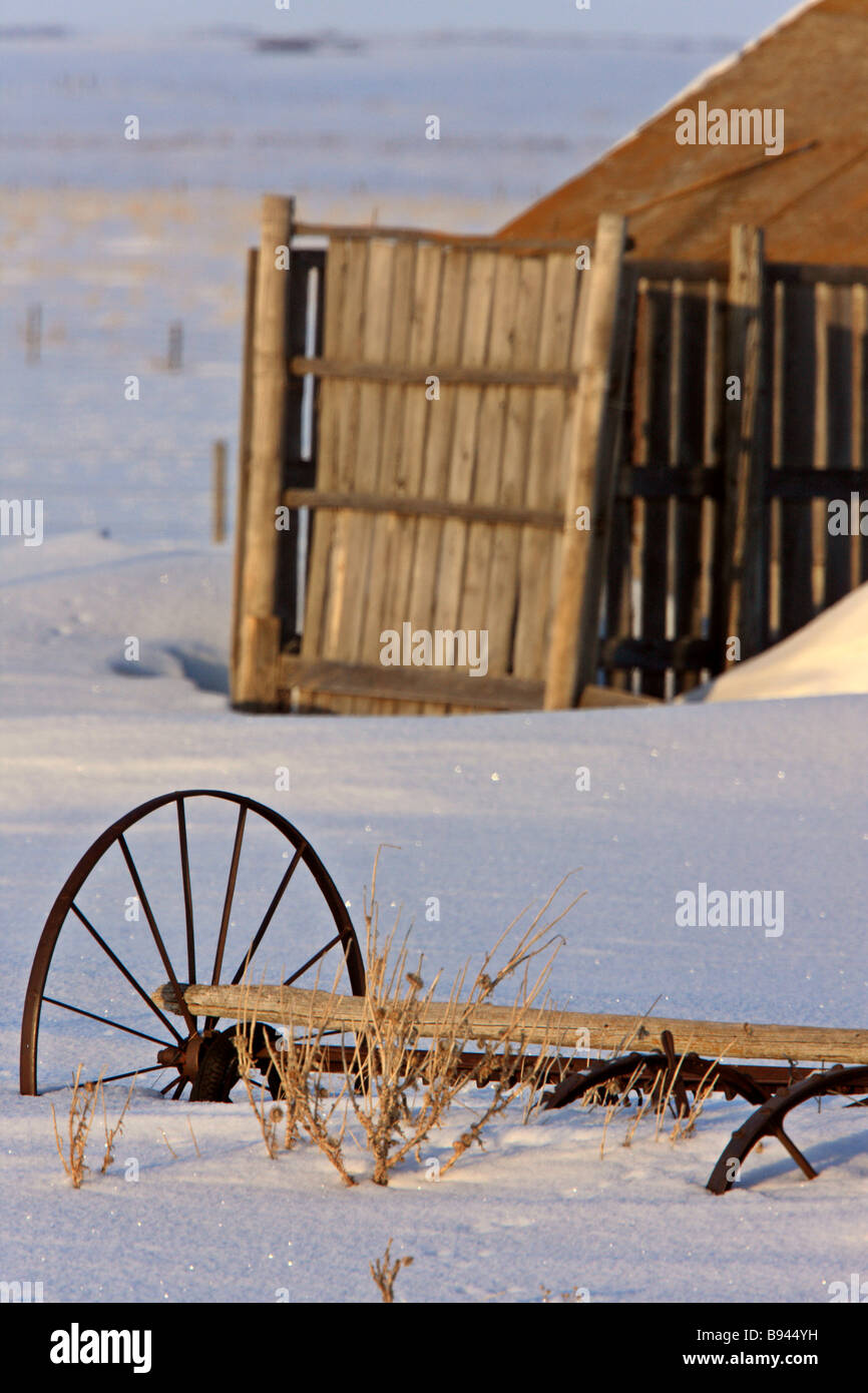 Old Barn and Wagon Wheel in Winter Saskatchewan Stock Photo - Alamy