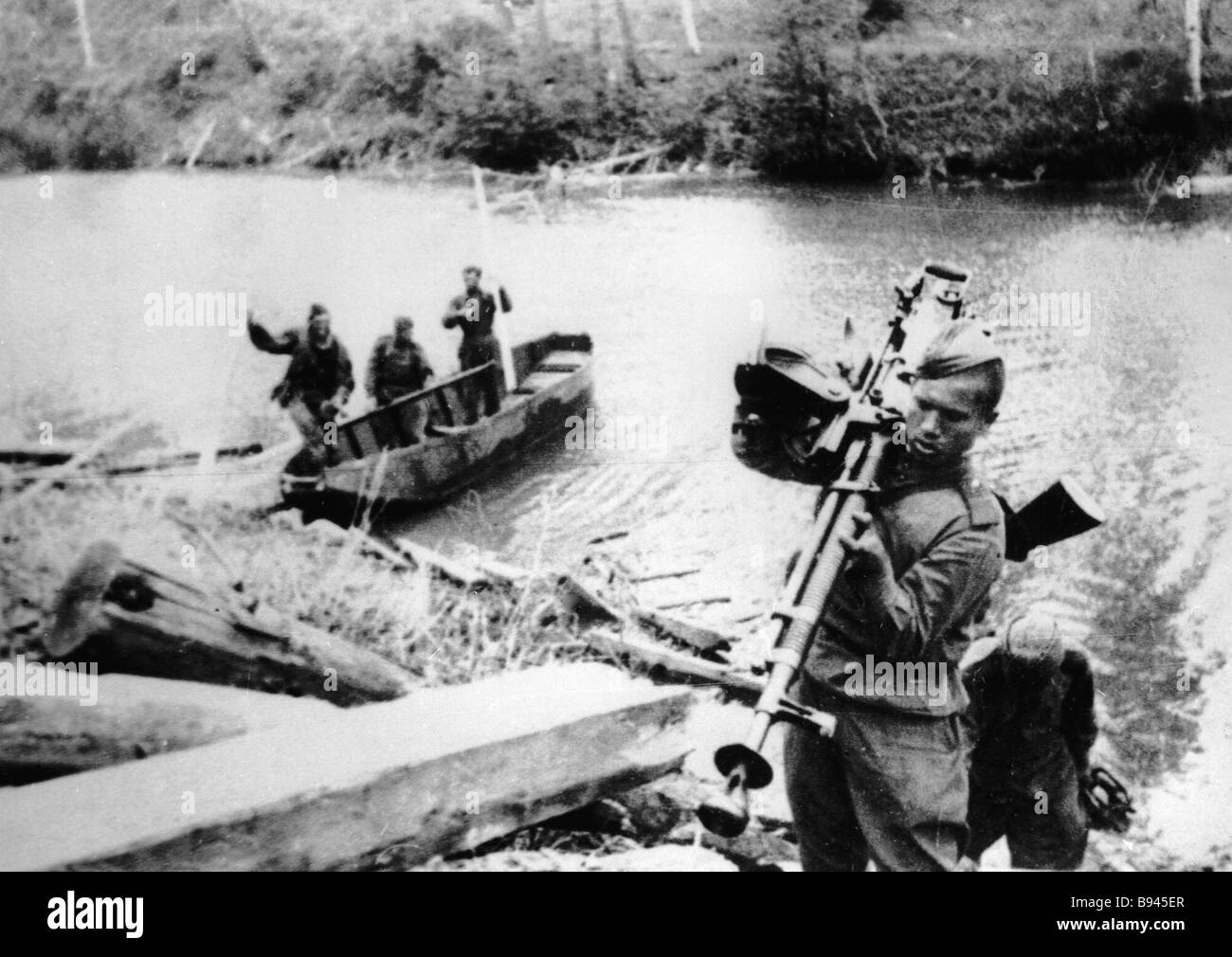 Red Army soldiers cross a river Stock Photo - Alamy