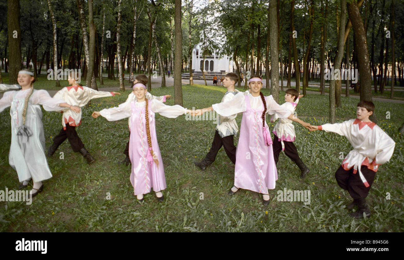 A folk ensemble doing a folk dance Stock Photo - Alamy