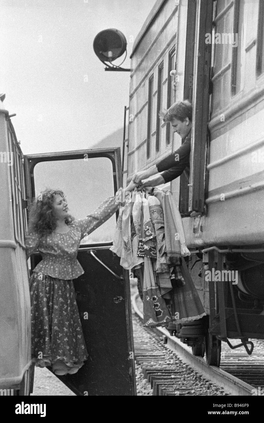 Artists of the Komsomolskaya Pravda propaganda train unloading costumes ...