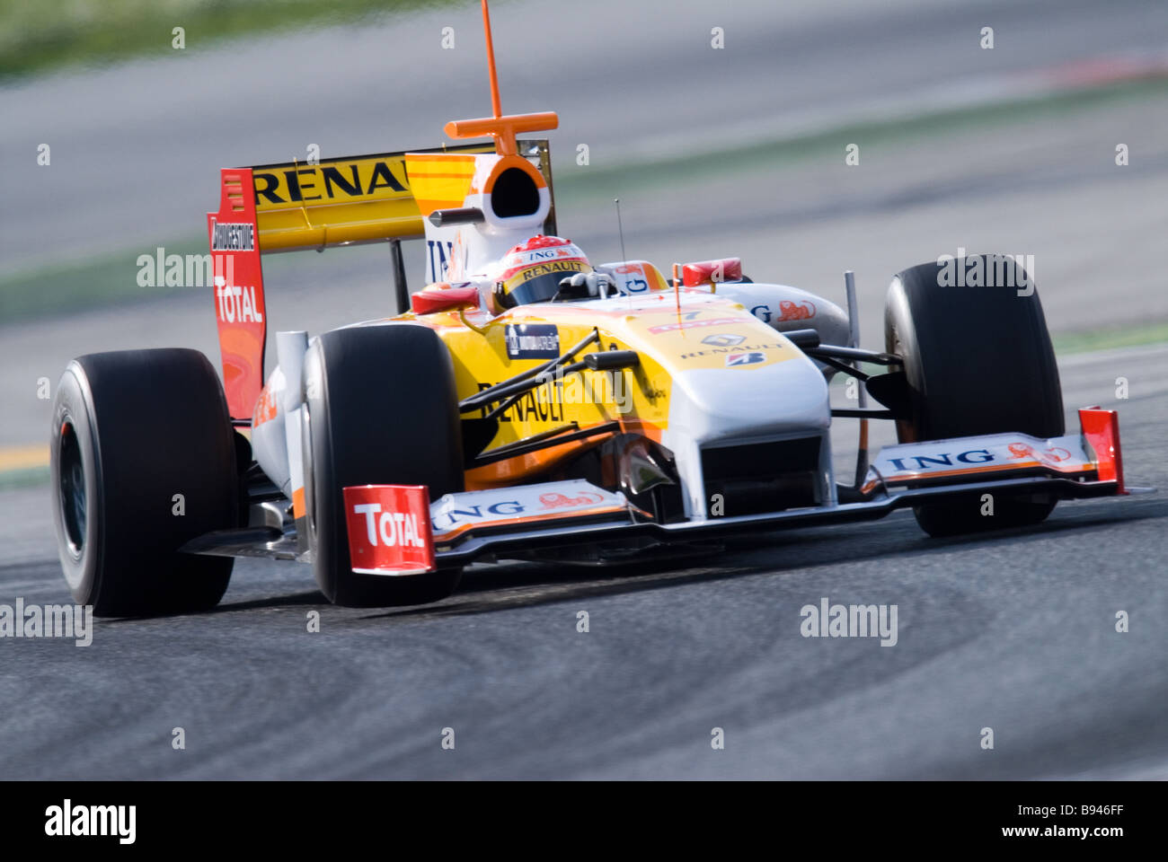 Fernando Alonso ESP in the Renault R29 racecar during Formula 1 testing ...