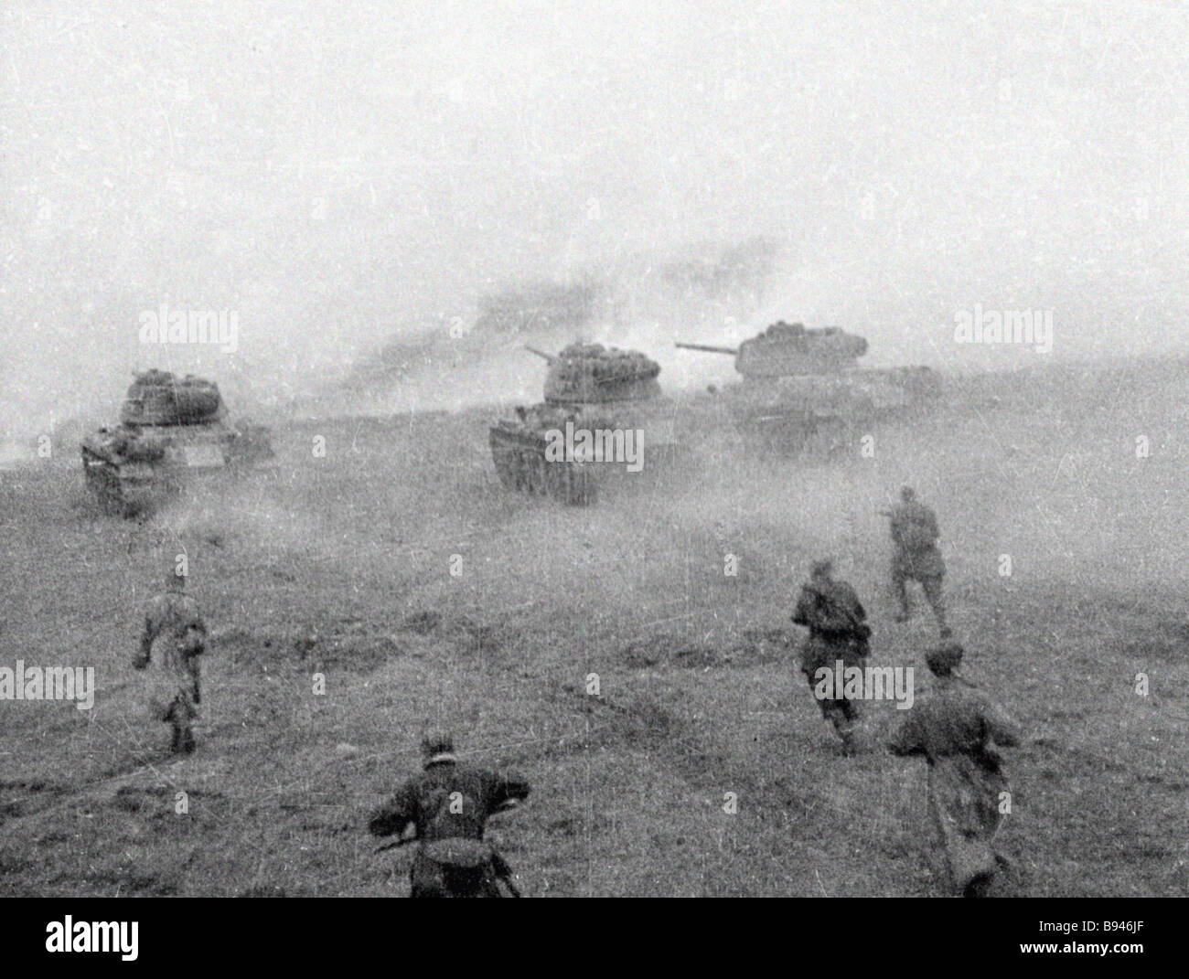 Soviet tanks and infantry attacking Stock Photo - Alamy