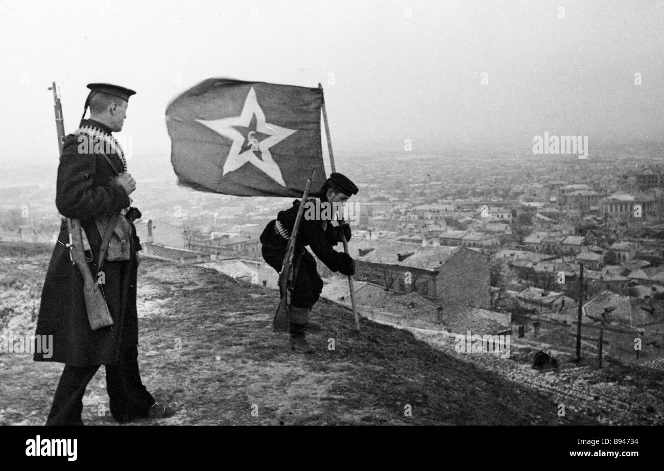 Marine landing troops raising a flag the symbol of liberation of Kerch ...