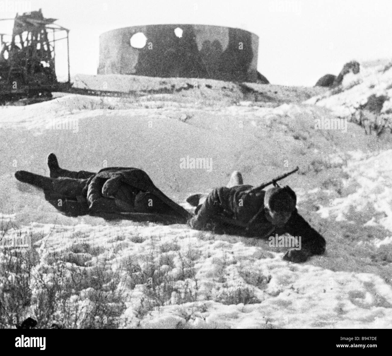 A soldier pulling a wounded man from the battlefield at Stalingrad ...