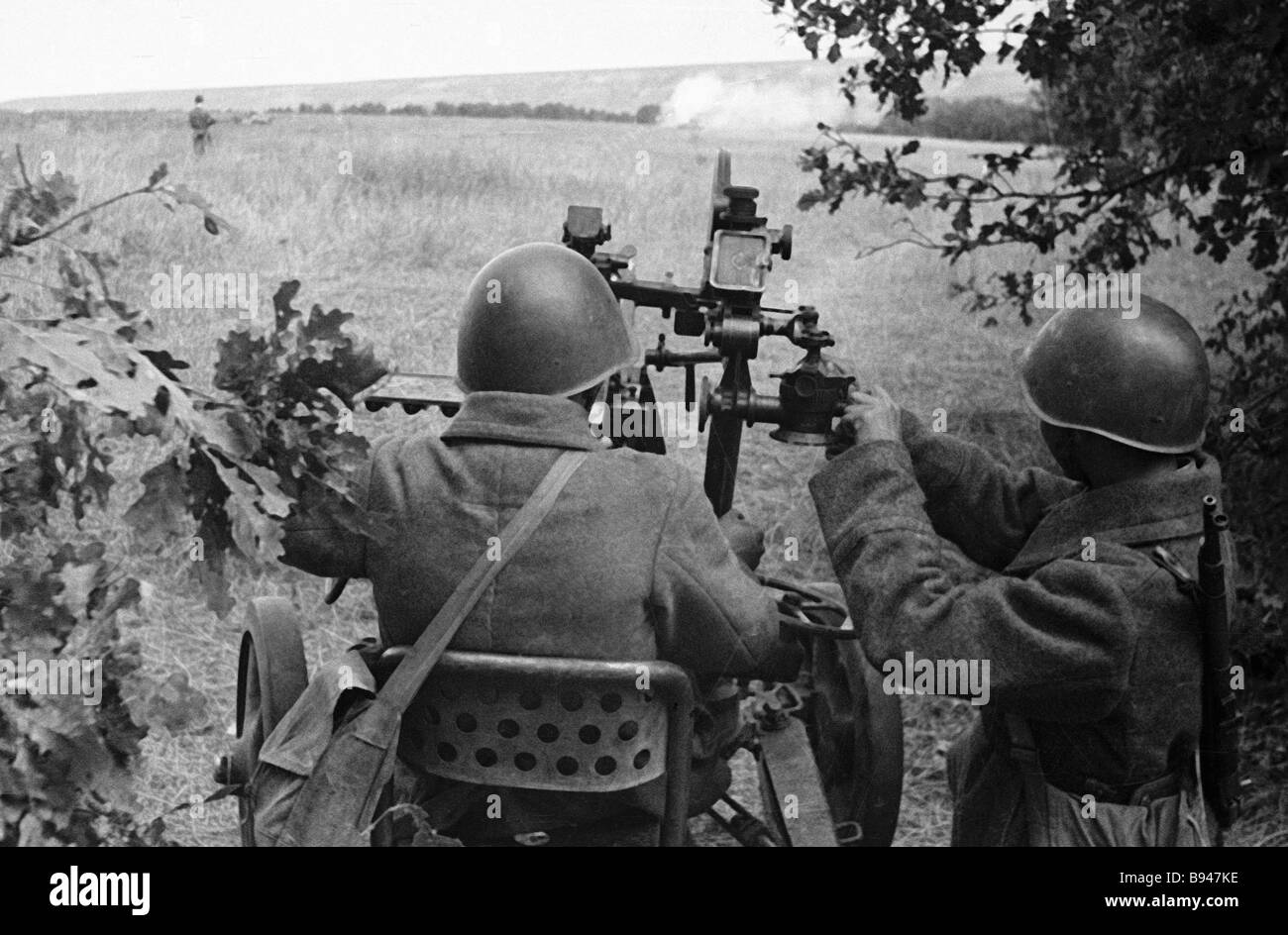 Don front soldiers shoot up a target from the captured machine gun ...