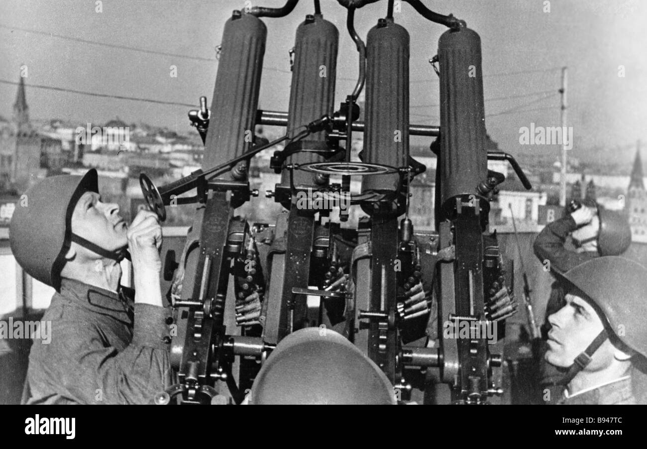 Anti aircraft gunners getting a machine gun ready for a fight during ...