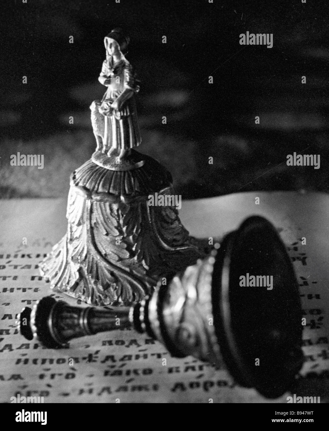 This nineteenth century ritual bell with figure of Christ is used ...