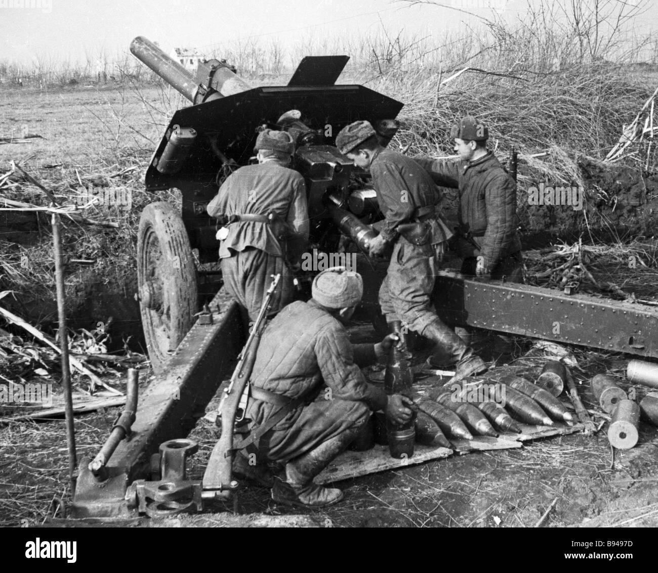 Soviet artillery guns firing away at German positions on the approaches ...