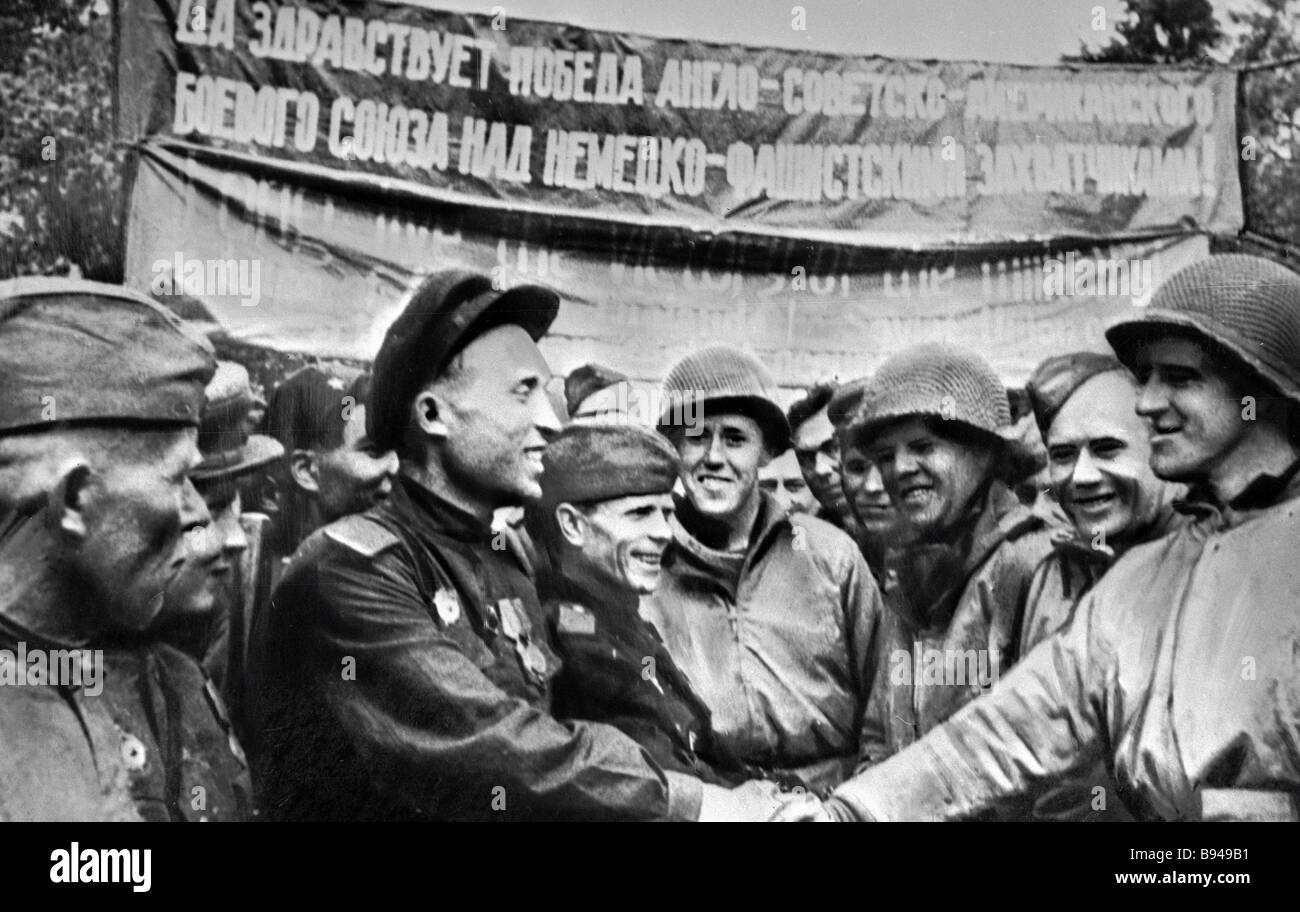 Soviet and U S soldiers meet each other on the Elbe River Stock Photo ...